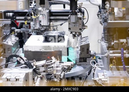 KUNSHAN, CHINA - FEBRUARY 2, 2023 - self-feeding injection molding ...