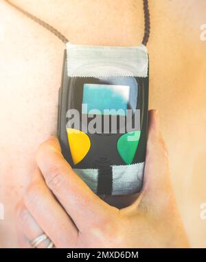 hand holter ecg device patch Stock Photo - Alamy