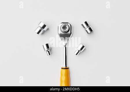 3D illustration of a ratchet wrench in cartoon style on a white ...