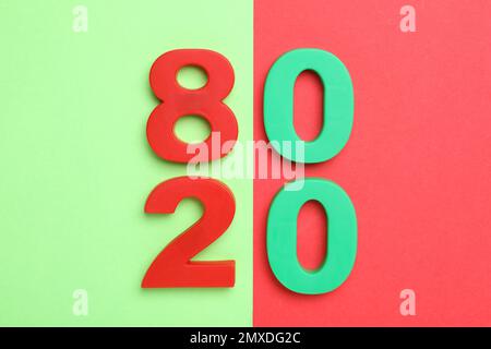 Colorful numbers 80 and 20 on white wooden background, flat lay. Pareto ...