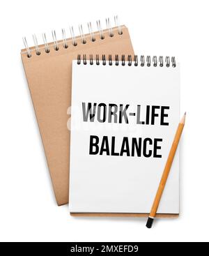 Work-life balance concept. Stylish notebooks, pen and branch on white ...