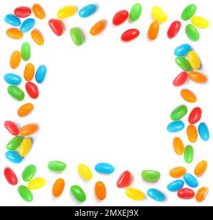 Frame made of different jelly beans on yellow background Stock Photo ...