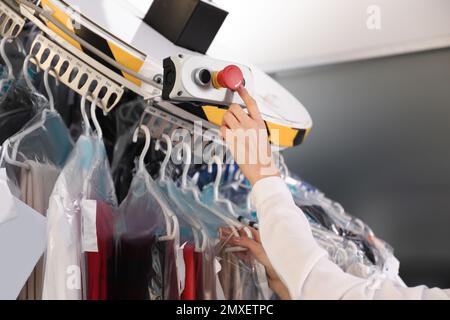 Control panel of garment conveyor at dry-cleaner's, closeup Stock Photo ...