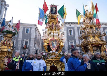 People seen around the traditional Candeloras on the street of Catania ...