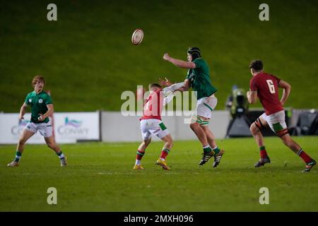 Conor O'Tighearnaigh #5 of Ireland U20's stretches over the line to ...