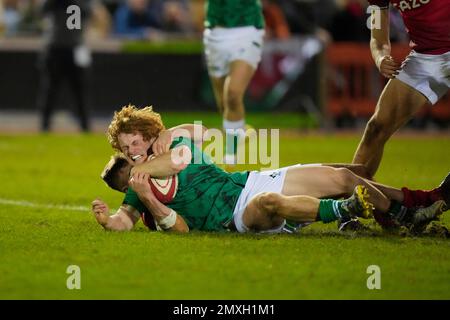 Henry McErlean #23 of Ireland U20's stretches for the try line to score ...
