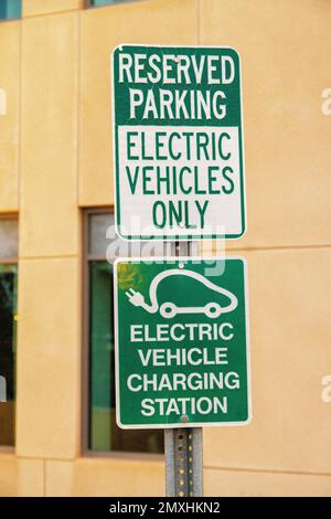 Reserved Parking Electric Vehicle Charging Only sign with pictograph ...