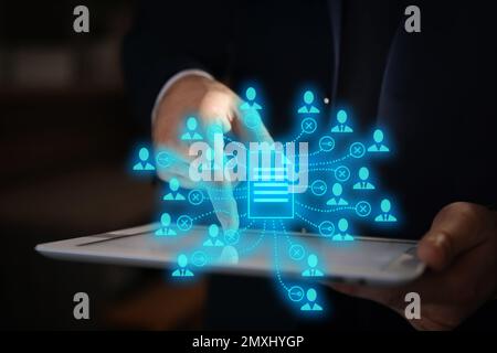 Access to documents. Man using tablet, closeup. Scheme over device ...