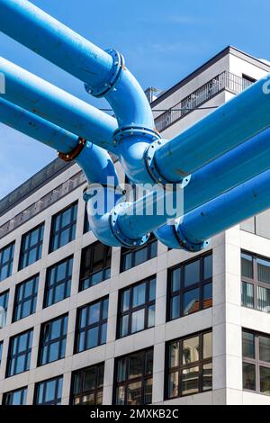 Construction site, blue pipes of a supply line on a construction site ...