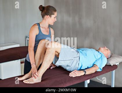 Helping her patients stay strong and healthy. a a physical therapist ...