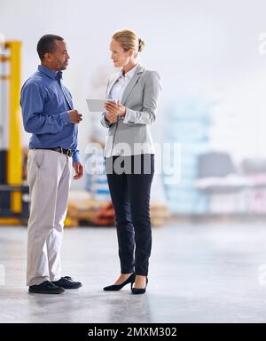 Blond woman asking questions to male emergency worker in front of ...