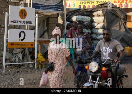 People stand in the streets in Juba, South Sudan, before Pope Francis ...