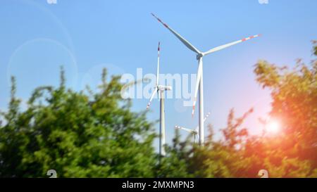 Wind mills during bright summer day Stock Photo - Alamy