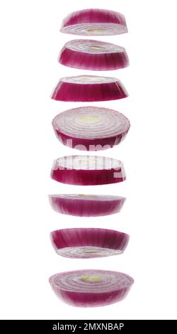Red onion slices falling on white background Stock Photo - Alamy
