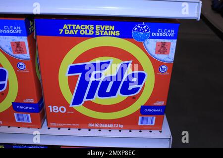 Powdered Tide in boxes on a shelf closeup Stock Photo - Alamy