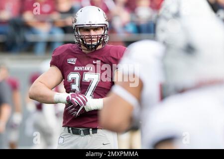 Montana defensive end Caleb Kidder (37) sings the school fight song ...