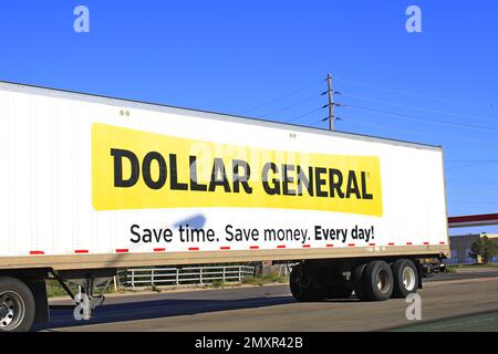 Dollar General delivery Semi truck at a Dollar General with blue sky in ...