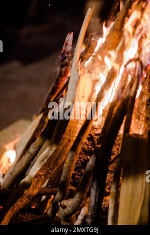 A vertical shot of a big bonfire at night Stock Photo - Alamy