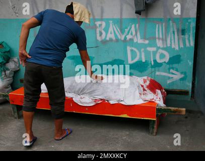 The man is wrapped in a cloth. The body is shrouded in a veil. The ...