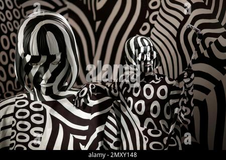 Model feebee poses as part of art installation “Dazzle room” made by ...