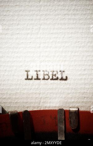Libel word written with a typewriter Stock Photo - Alamy