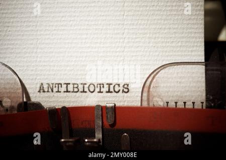 Antibiotics word written with a typewriter Stock Photo - Alamy
