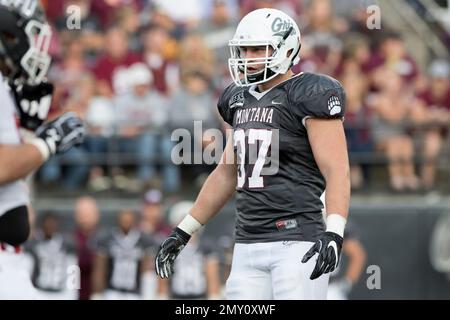 Montana defensive end Caleb Kidder (37) sings the school fight song ...
