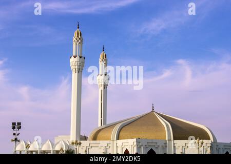 Beautiful front view of the entrance of Hassan En any Mosque at sunset ...