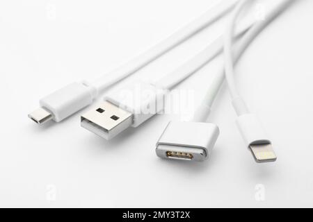 Charge cables on white background. Modern technology Stock Photo - Alamy