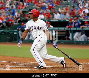 Texas Rangers' Adrian Beltre follows through on a double to right off ...