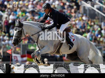 France's Philippe Rozier, riding Rahotep De Toscane, competes in the ...