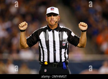 NFL referee John Hussey signals time out during an NFL preseason ...
