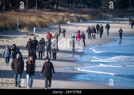 Binz, Germany. 04th Feb, 2023. Tourists walk on the beach of the Baltic ...