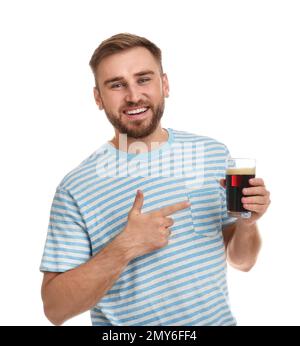 Handsome man with cold kvass on light grey background. Traditional ...