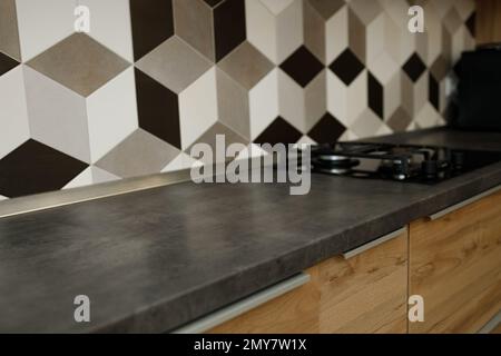 Table board and defocused modern kitchen background Stock Photo - Alamy