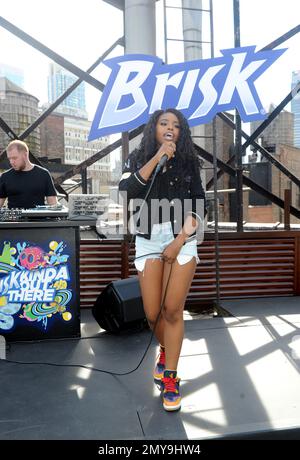 IMAGE DISTRIBUTED FOR BRISK - Chicago rapper Dreezy, right, and world ...