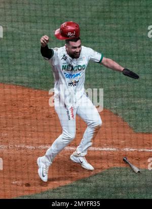 Mexico's Julian Ornelas celebrates at after scoring the winning run ...