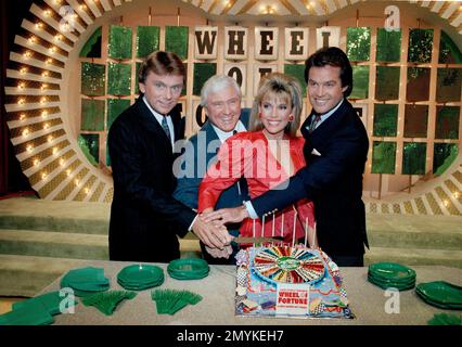WHEEL OF FORTUNE, (from left): co-host Susan Stafford, host Chuck ...