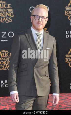 Owain Rhys Davies arrives at the premiere of "Alice Through the Looking ...