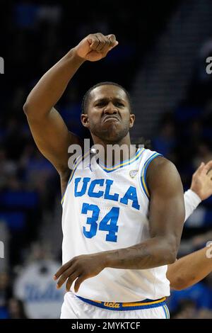 UCLA guard David Singleton celebrates during the second half of an NCAA ...