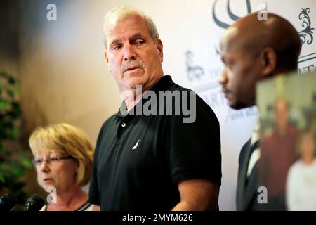 Kevin Sherman, center, speaks while standing next to his wife Mary Ann ...