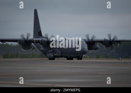 An AC-130J Ghostrider Gunship undergoes pre-flight operations at ...