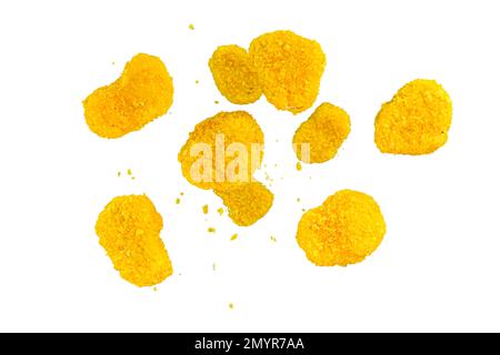 Falling chicken nuggets isolated on a white background, clipping path ...
