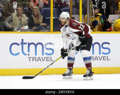 Colorado Avalanche defenseman Zach Redmond (22) and Chicago Blackhawks ...