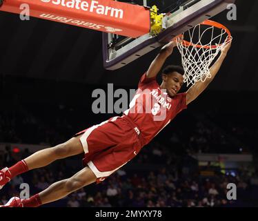 Alabama guard Rylan Griffen, center, is high-fived by fans after ...
