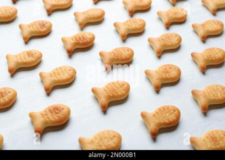 Delicious goldfish crackers on white background, closeup Stock Photo ...