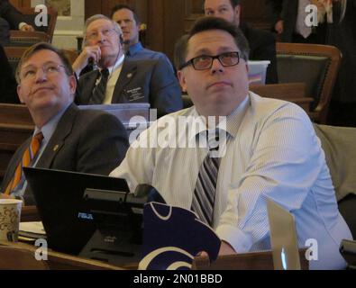 Kansas state Reps. John Whitmer, left, R-Wichita, and Marc Rhoades ...
