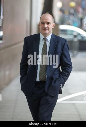 Conservative party chairman Jake Berry (centre), walks across the Hyatt ...