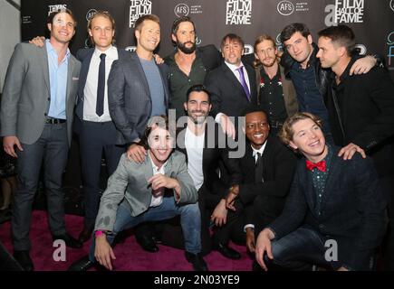 Temple Baker, left, and Austin Amelio arrive at the premiere of ...