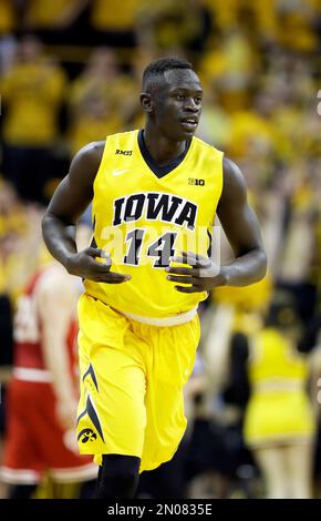 Iowa guard Peter Jok reacts with fans after an NCAA college basketball ...